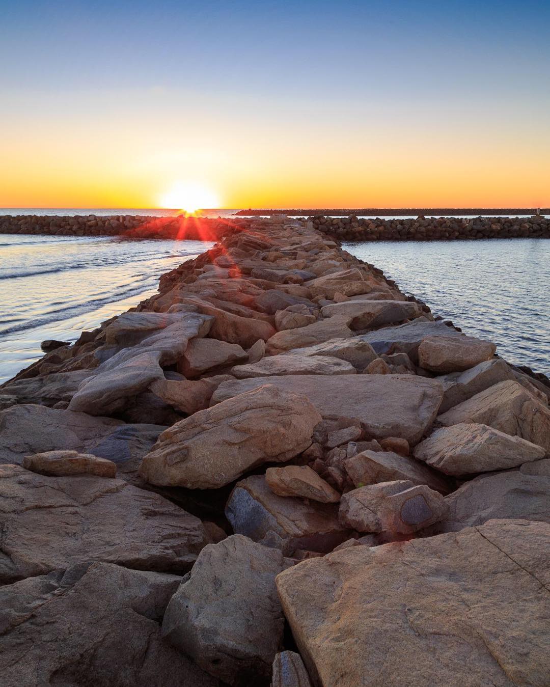 @Canon: "Sunset views from the breakwater walls protecting the ...