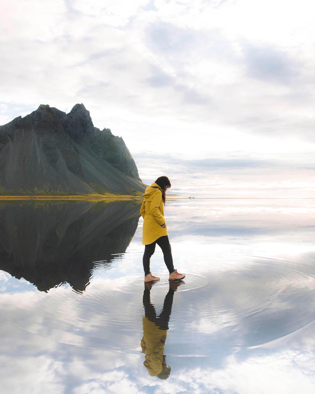 @Canon: "Morning reflections after a sleepless night. The sun doesn’t always shine in Ic ...