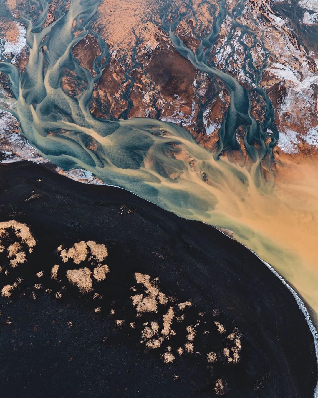 Canon: "Icelandic textures along the southern coast. As glaciers ...